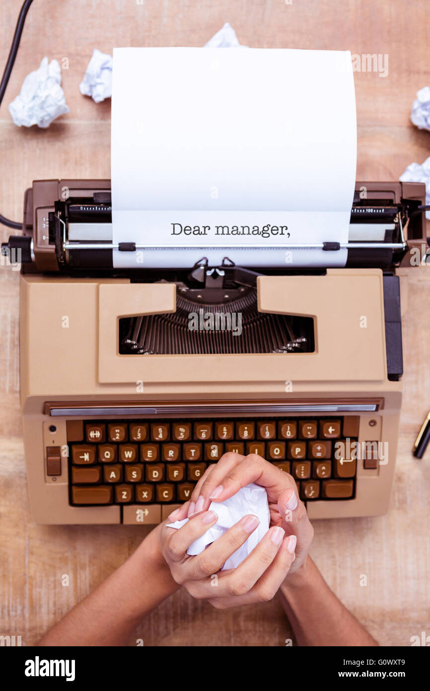 Dear manager, against above view of old typewriter Stock Photo - Alamy