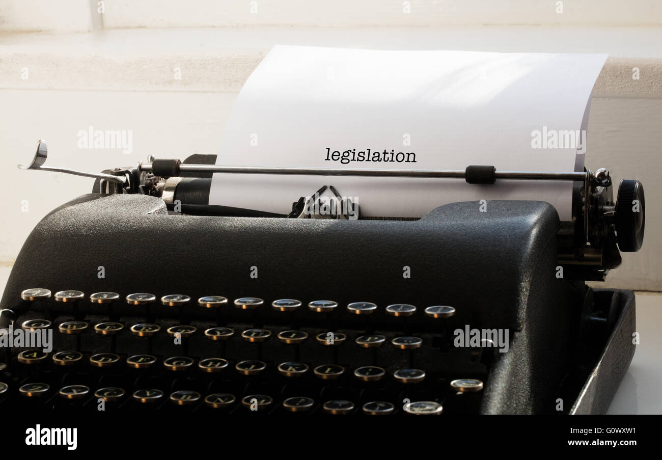 Legislation against typewriter on a table Stock Photo - Alamy