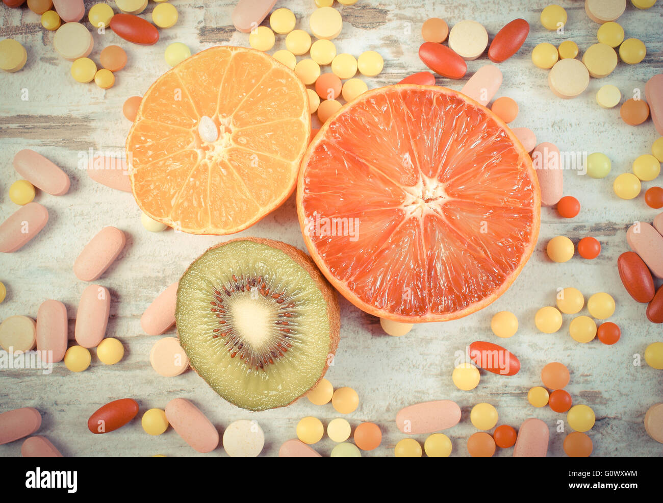 Vintage photo, Fresh natural fruits and medical pills, tablets and ...