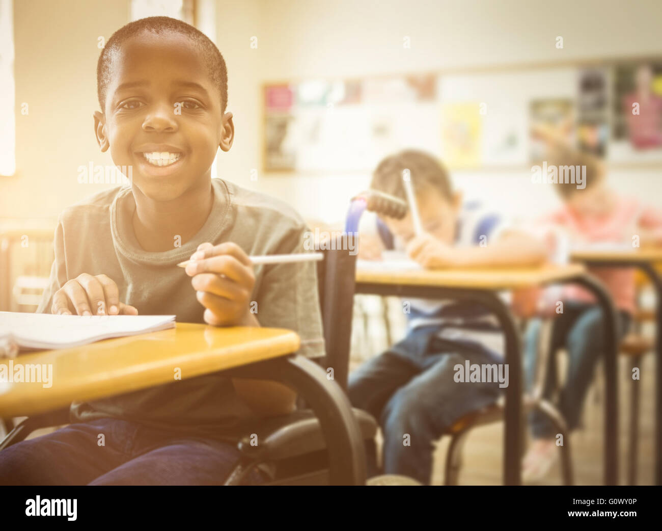 Child in wheelchair in class hi-res stock photography and images - Alamy