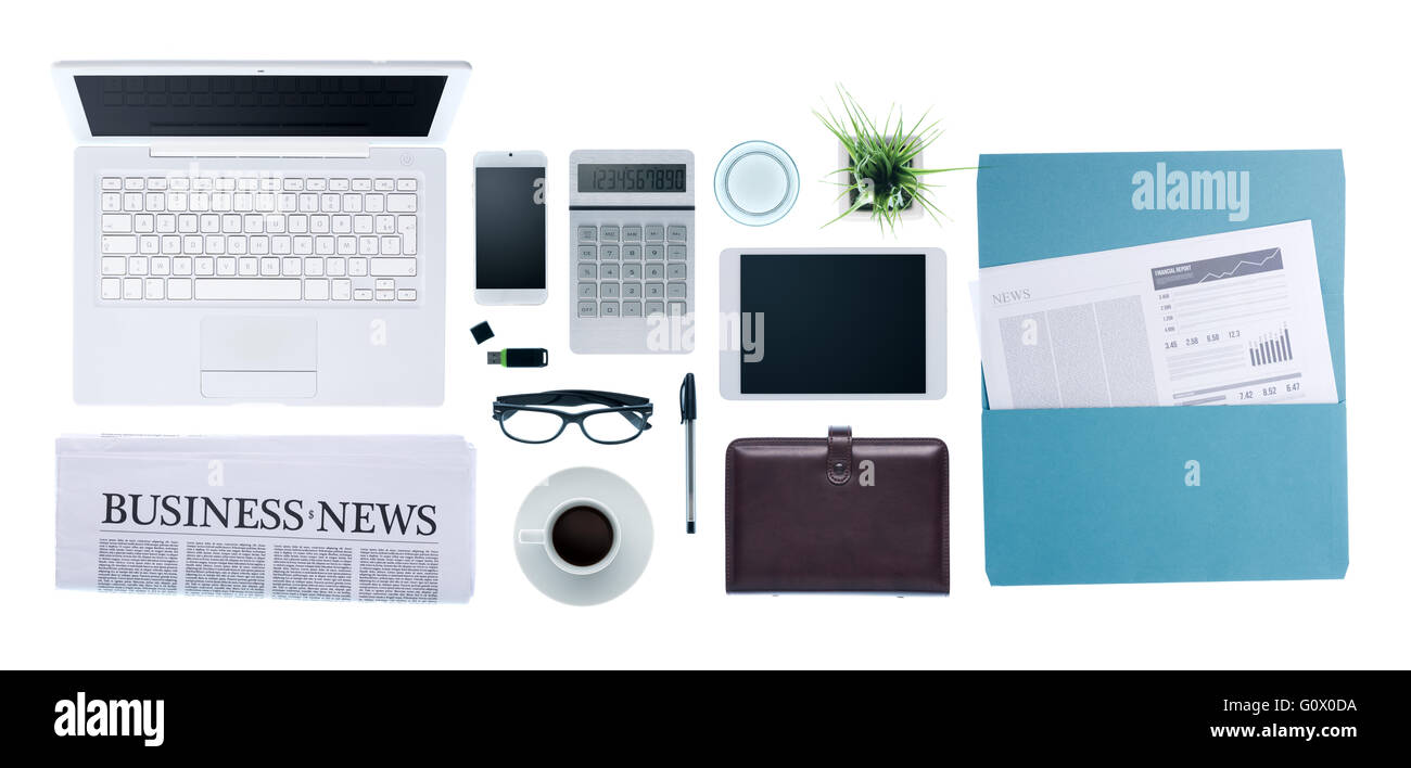 Hi-tech business desktop with computer, smartphone, paperwork and ...
