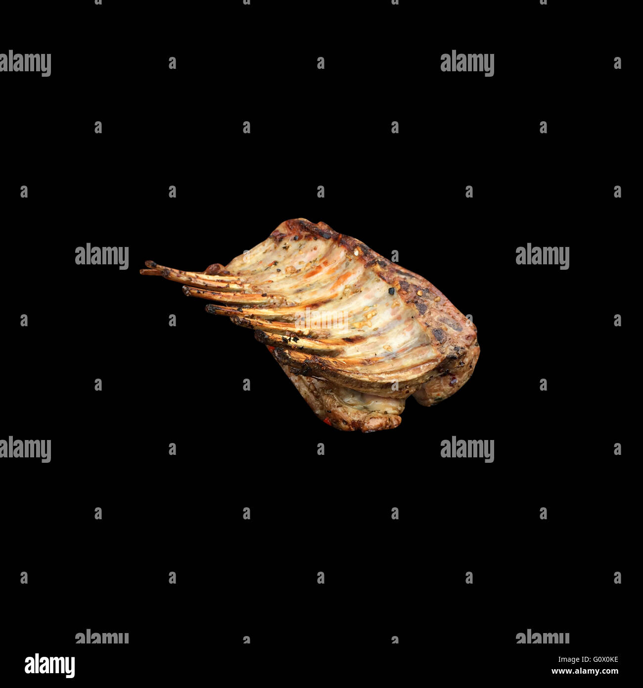 Lamb chop on black Stock Photo - Alamy