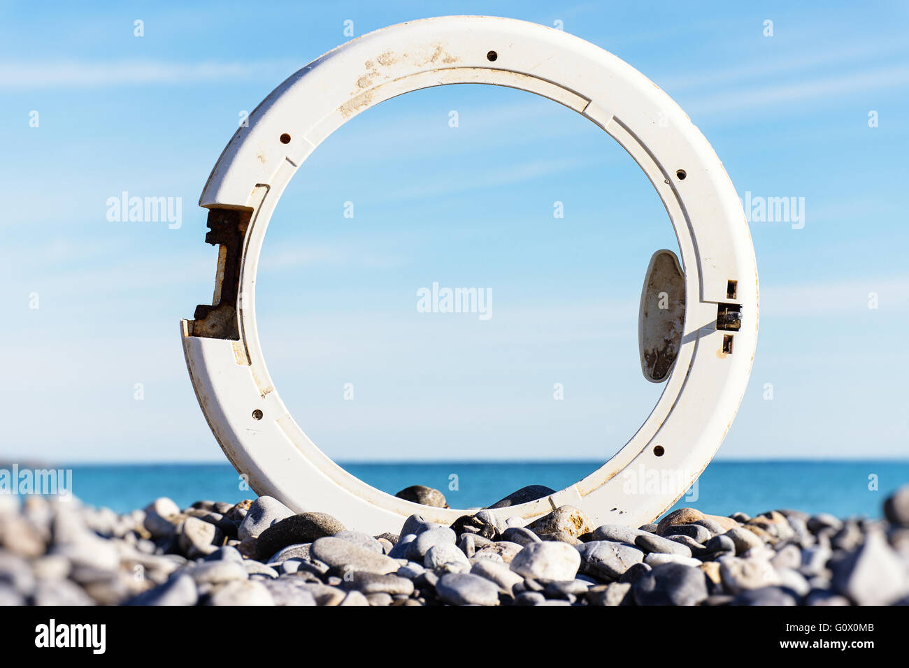 portholes, washing machine, beach, trash Stock Photo - Alamy