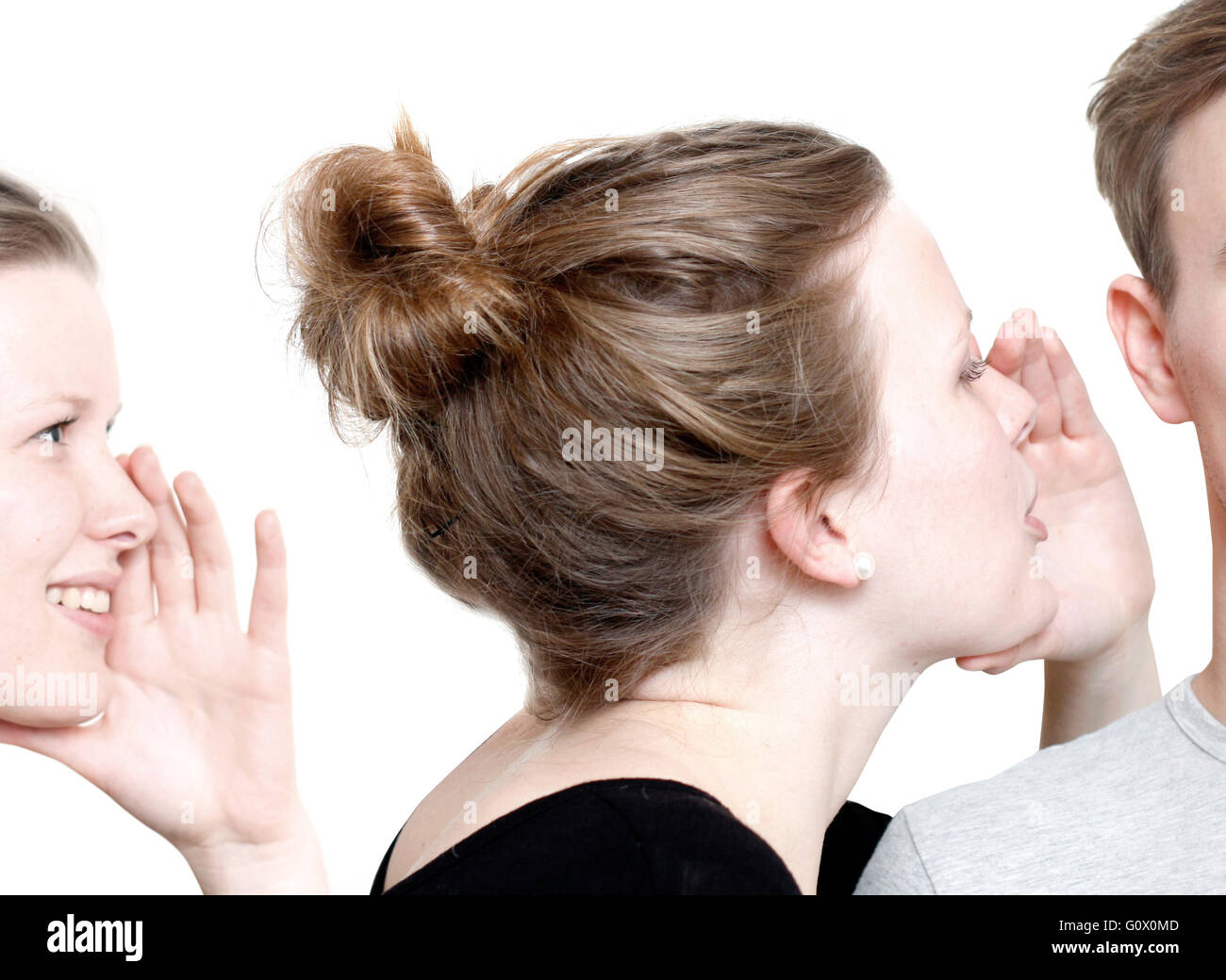 A girl whispering Stock Photo - Alamy