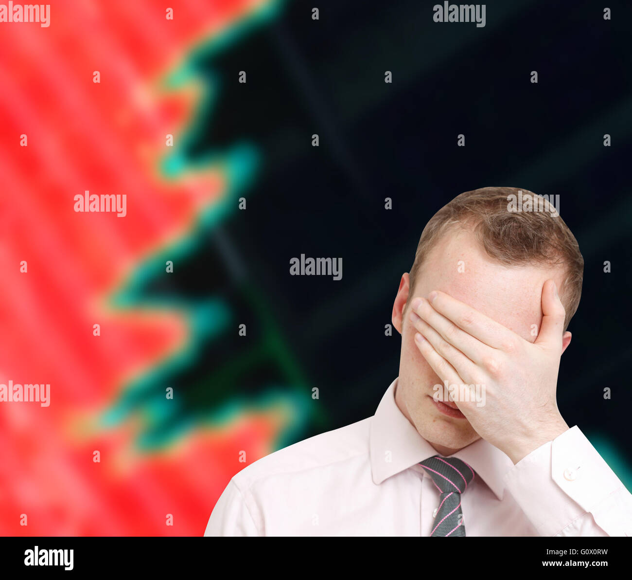 Depressed businessman losing money Stock Photo - Alamy