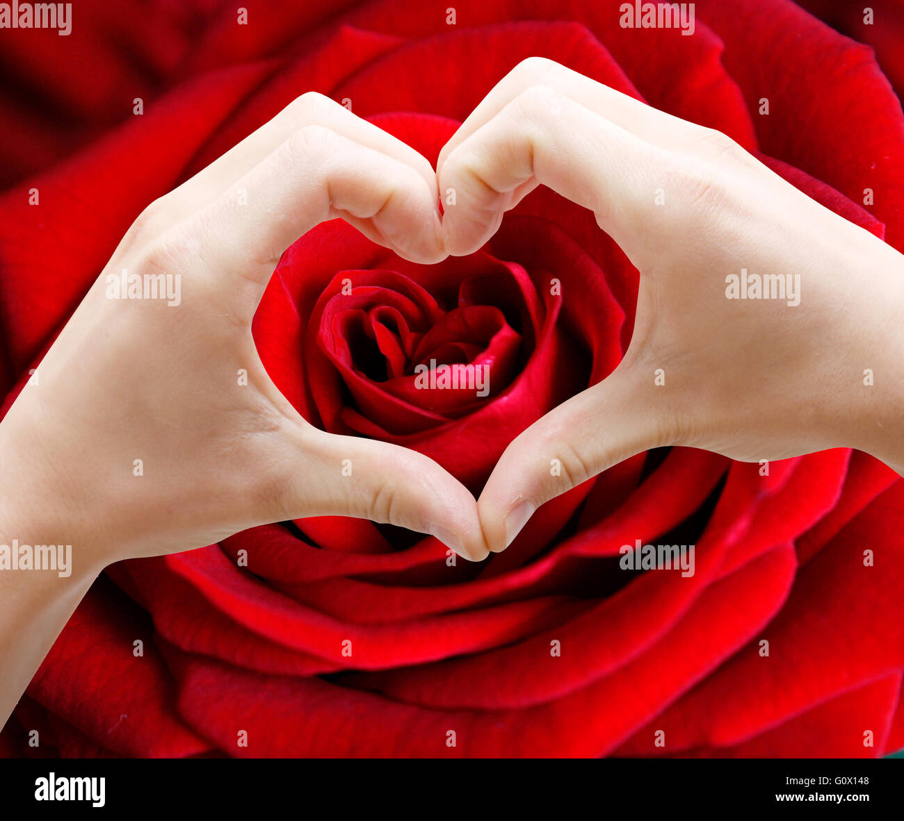 Hands creating a heart Stock Photo - Alamy