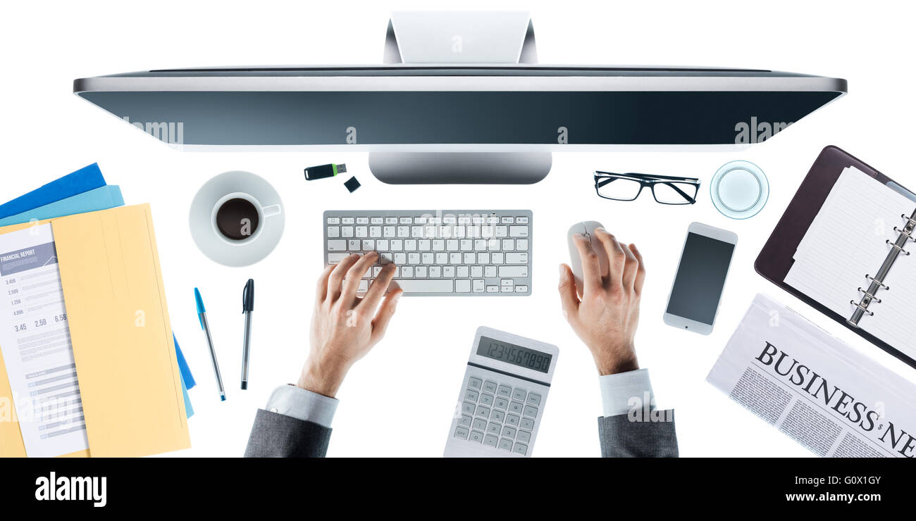 Businessman working at computer at office desk, top view Stock Photo ...