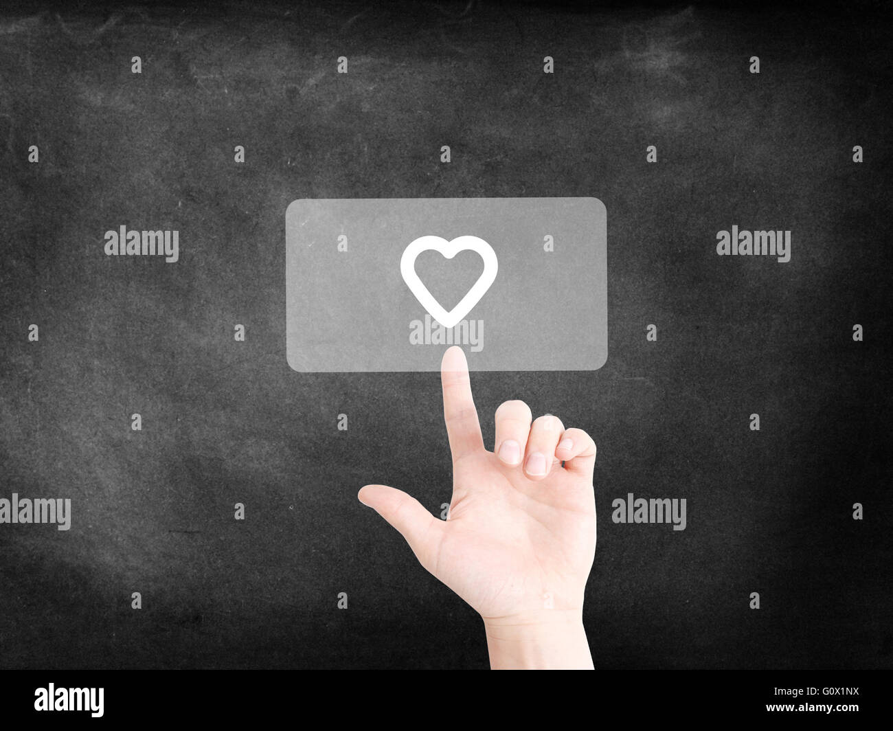 Finger tapping on an icon to symbolize a heart Stock Photo - Alamy