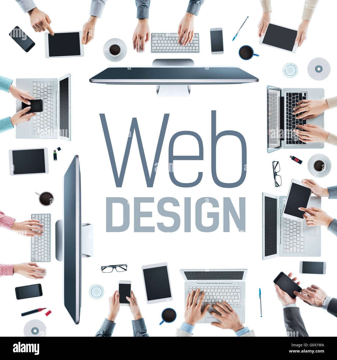 Web designers and developers team working at office desk, text at ...