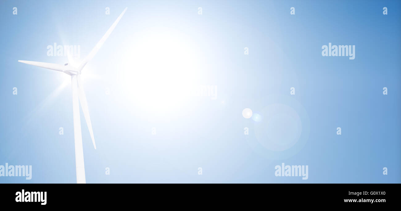 The sun shining on a wind turbine Stock Photo - Alamy