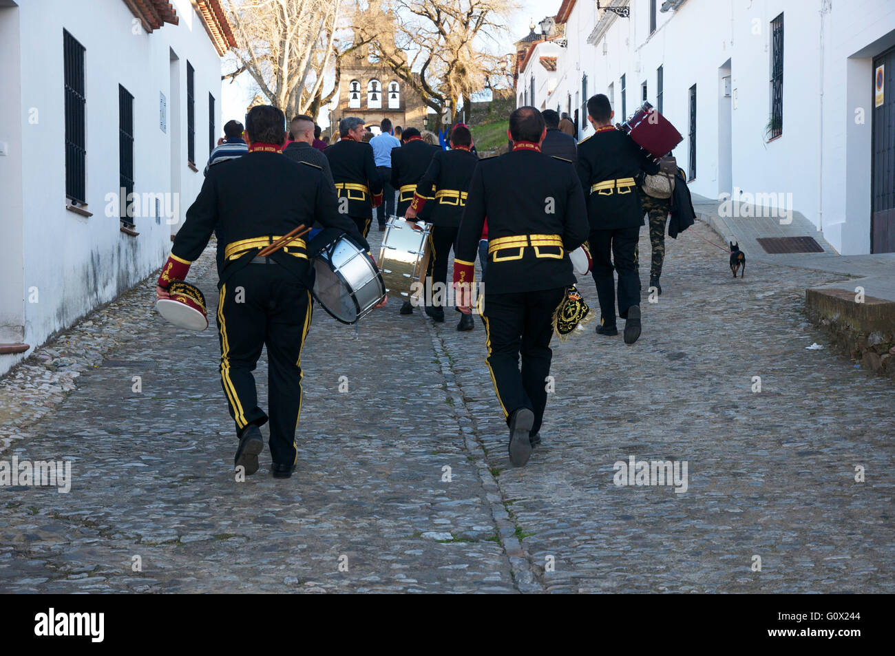 band members carrying brass instruments up hill Stock Photo - Alamy