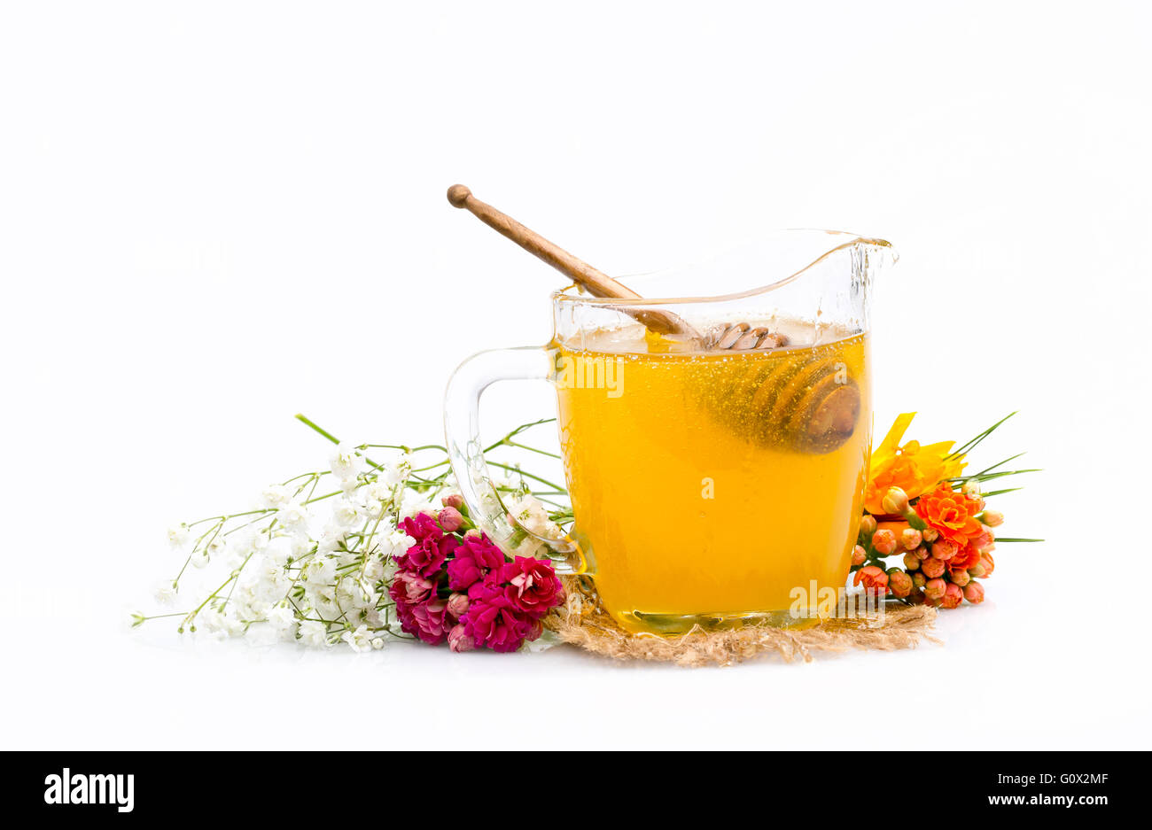 Hand dipper picking honey from hi-res stock photography and images - Alamy