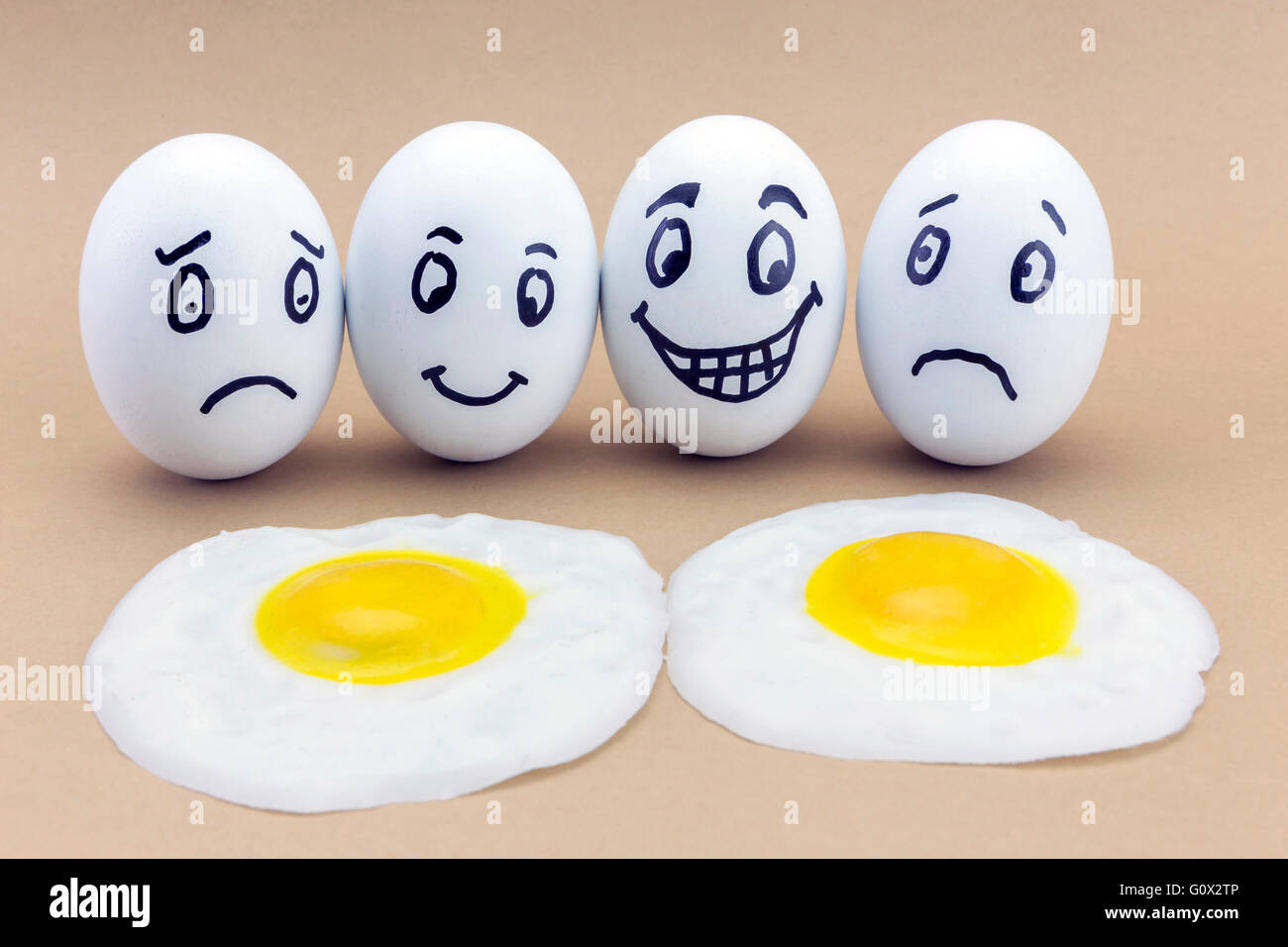 Funny emotional eggs crying and laughing in the box with yolk Stock ...