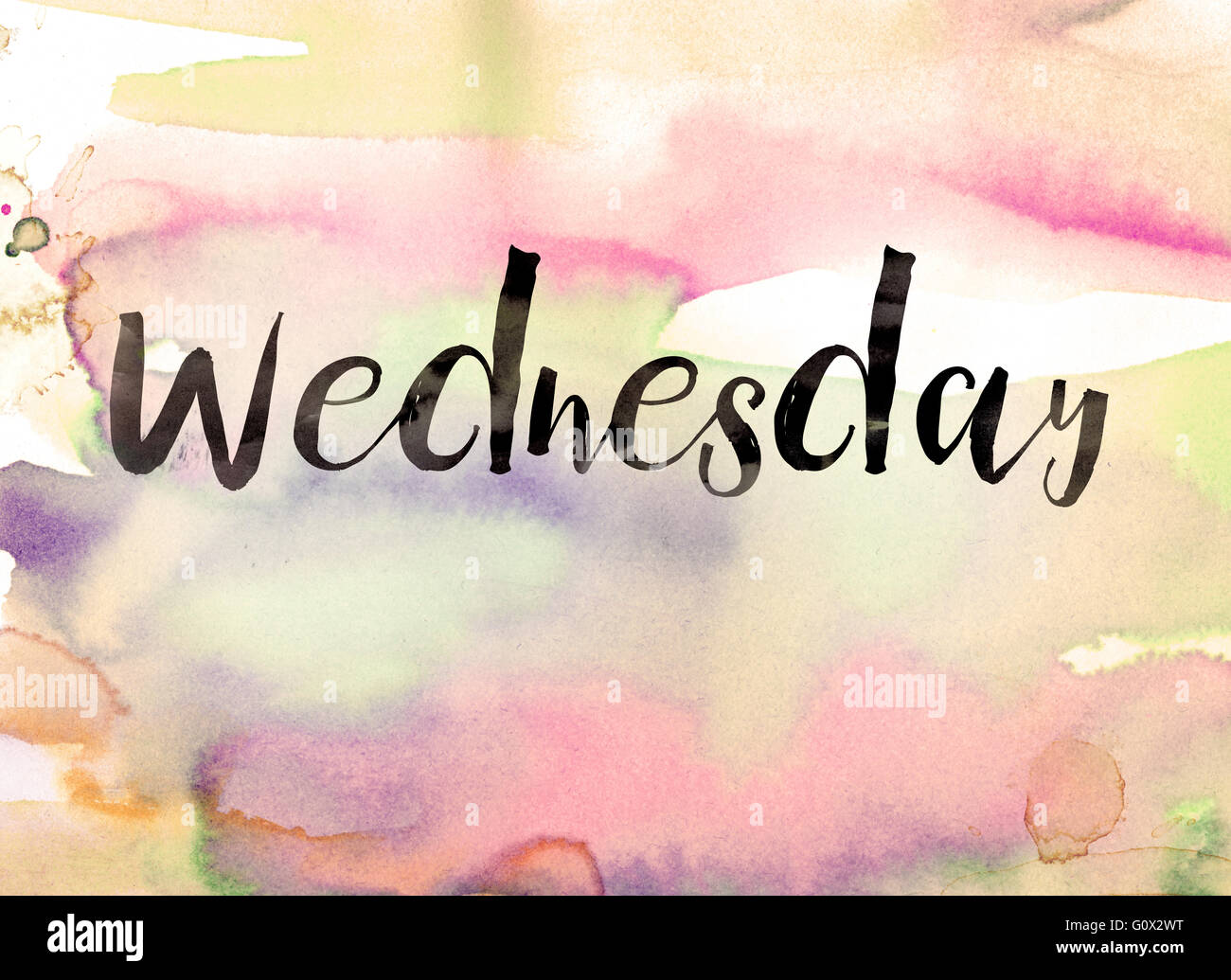 The word "Wednesday" written in black paint on a colorful watercolor ...