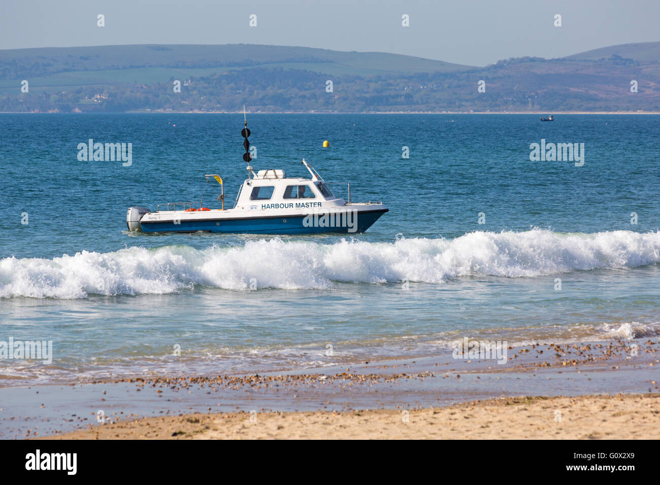 Harbour Master boat by Durley Chine beach, Bournemouth in May Stock ...