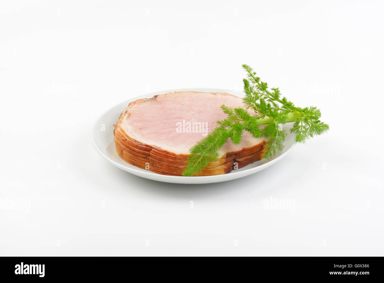 stack of ham slices and dill on white plate Stock Photo - Alamy