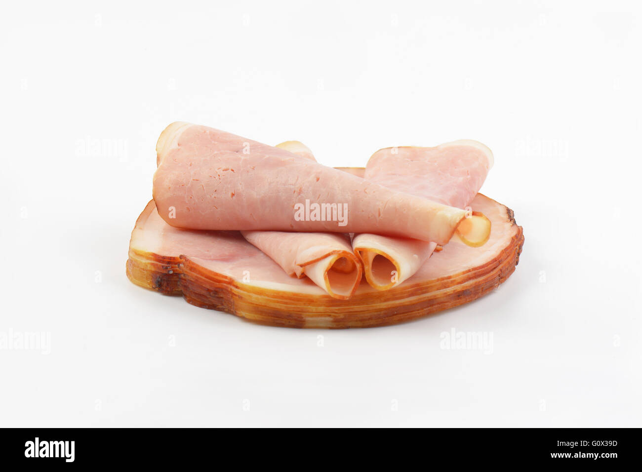 stack of ham slices arranged on white background Stock Photo - Alamy