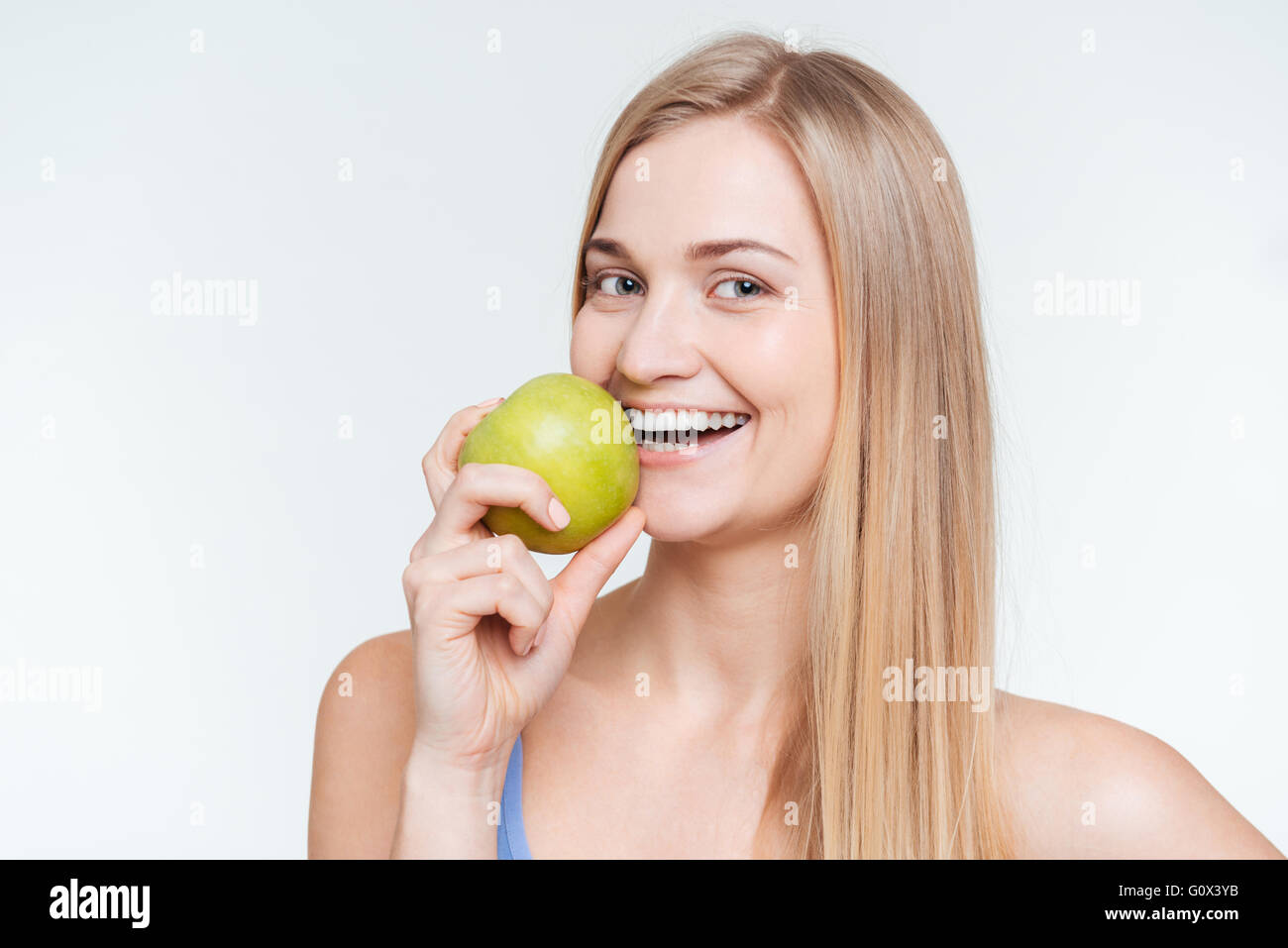Beautiful woman looking apple hi-res stock photography and images - Alamy