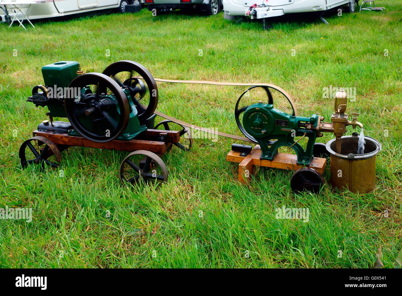 STATIONARY ENGINE DRIVING A F A PULLEN & CO WATER PUMP Stock Photo - Alamy