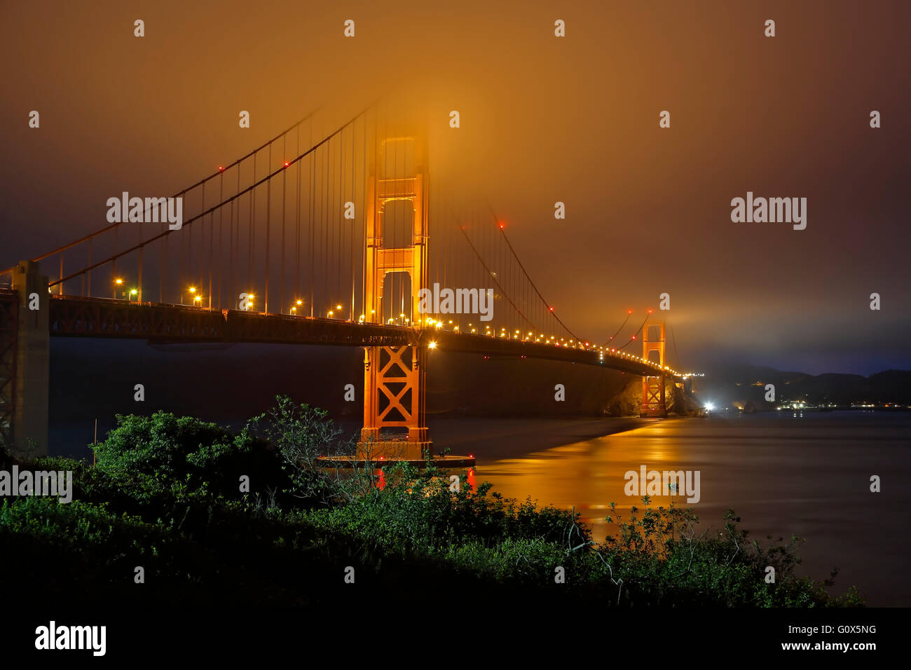 Golden Gate Bridge under fog, San Francisco, California USA Stock Photo ...
