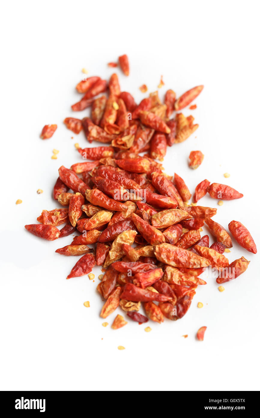 Birds Eye dried Chilli on white background Stock Photo - Alamy