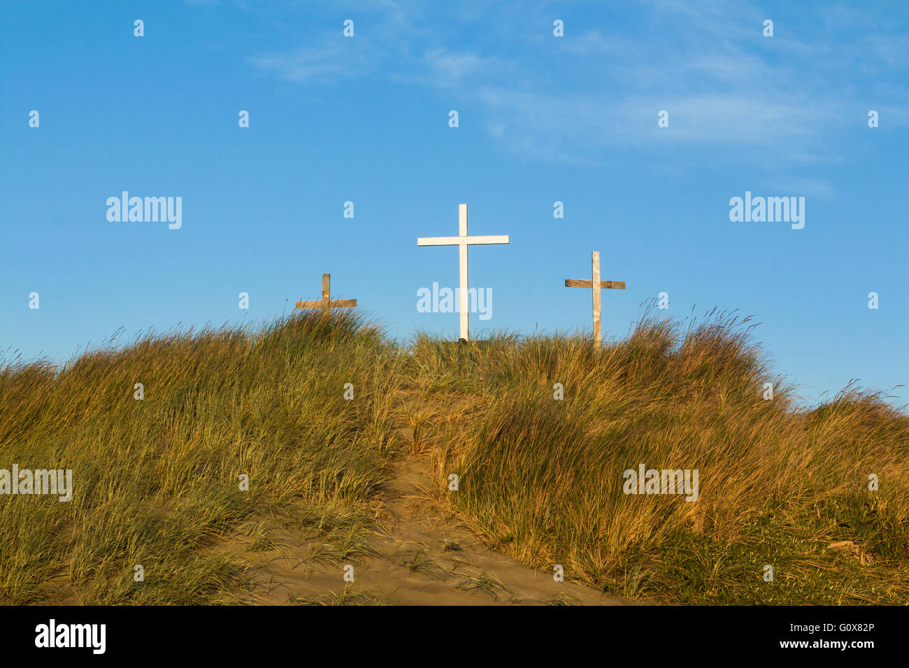 Three crosses on a hill with a pathway leading up to them Stock Photo ...