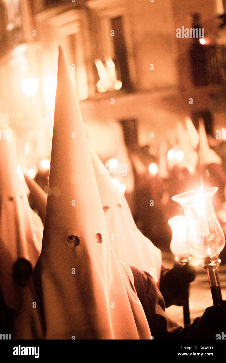 Easter catholic Spanish procession Semana Santa. Catholics wear pointed ...