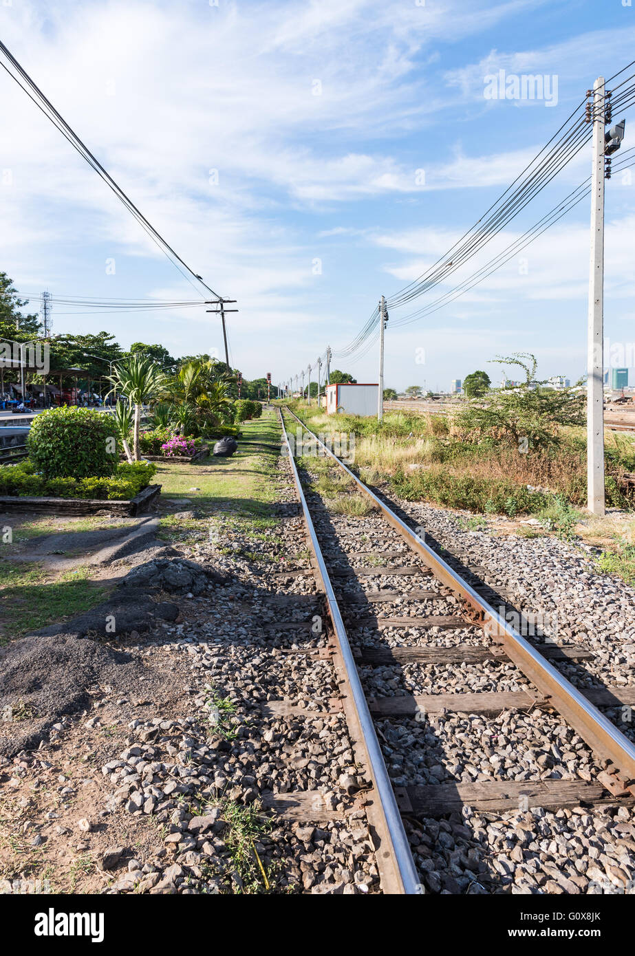Straight railway line from the junction of urban station Stock Photo ...