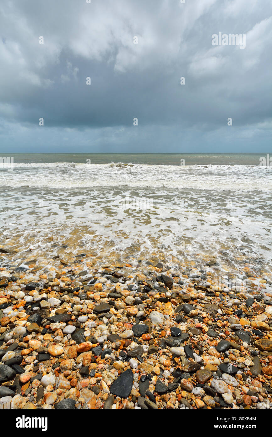 Pebble Beach with Rough Sea and Storm Clouds, Captain Cook Highway ...