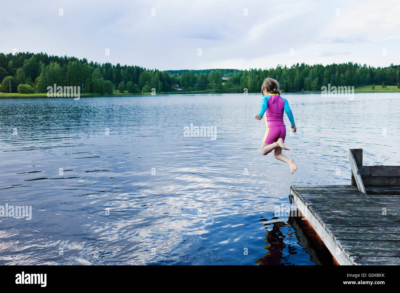 Girl wearing wetsuit hi-res stock photography and images - Alamy