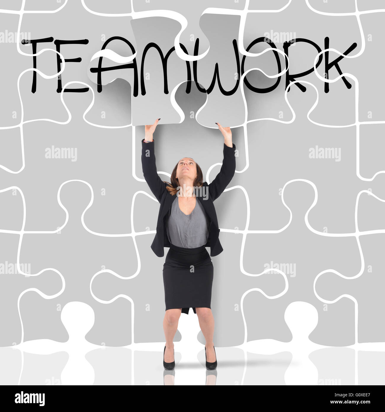 Teamwork puzzle building hi-res stock photography and images - Alamy