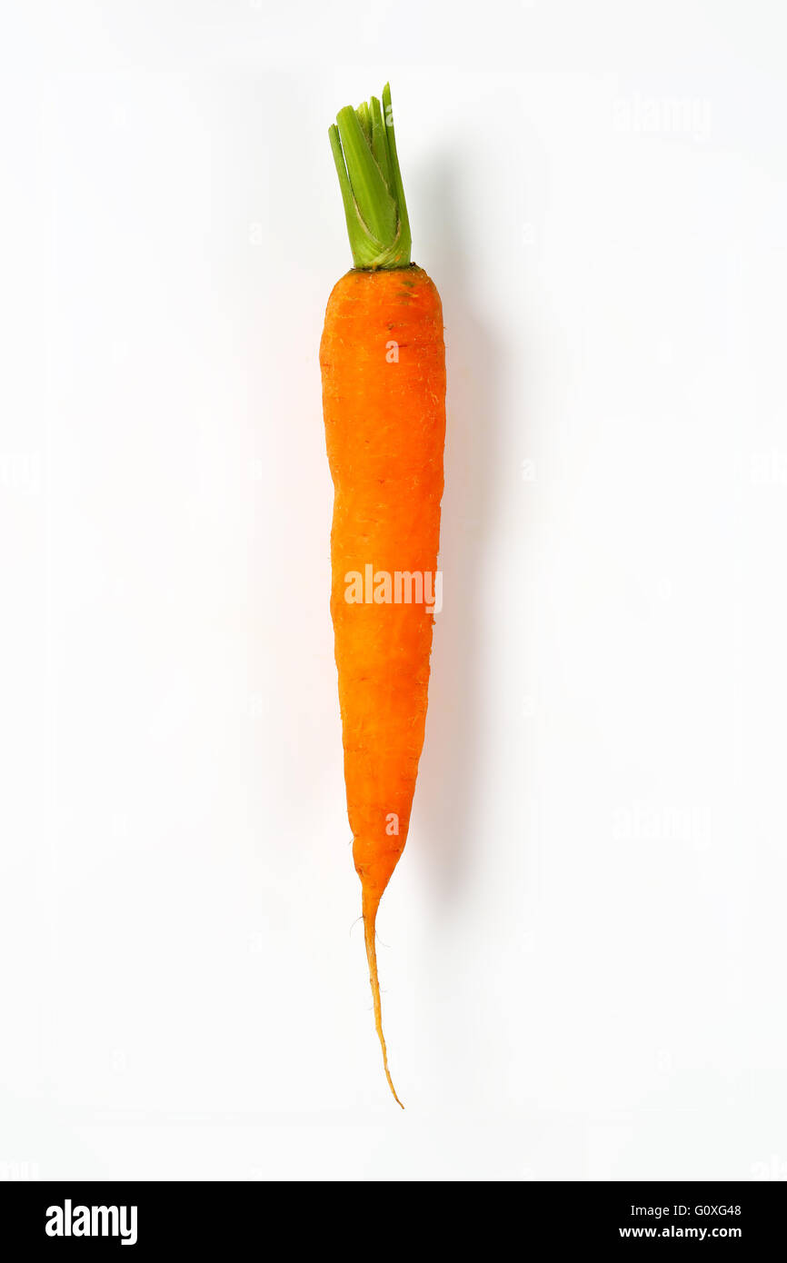 fresh long carrot on white background Stock Photo - Alamy