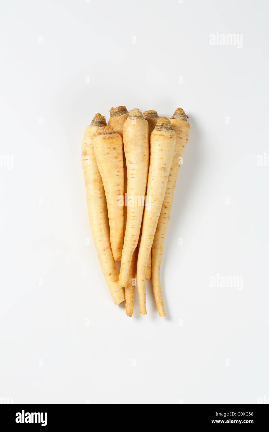 bunch of fresh root parsley on white background Stock Photo - Alamy