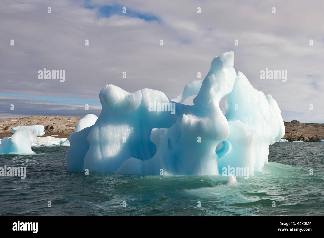 Weathered, naturally sculptured icebergs in a bay at Kalkstranda on ...