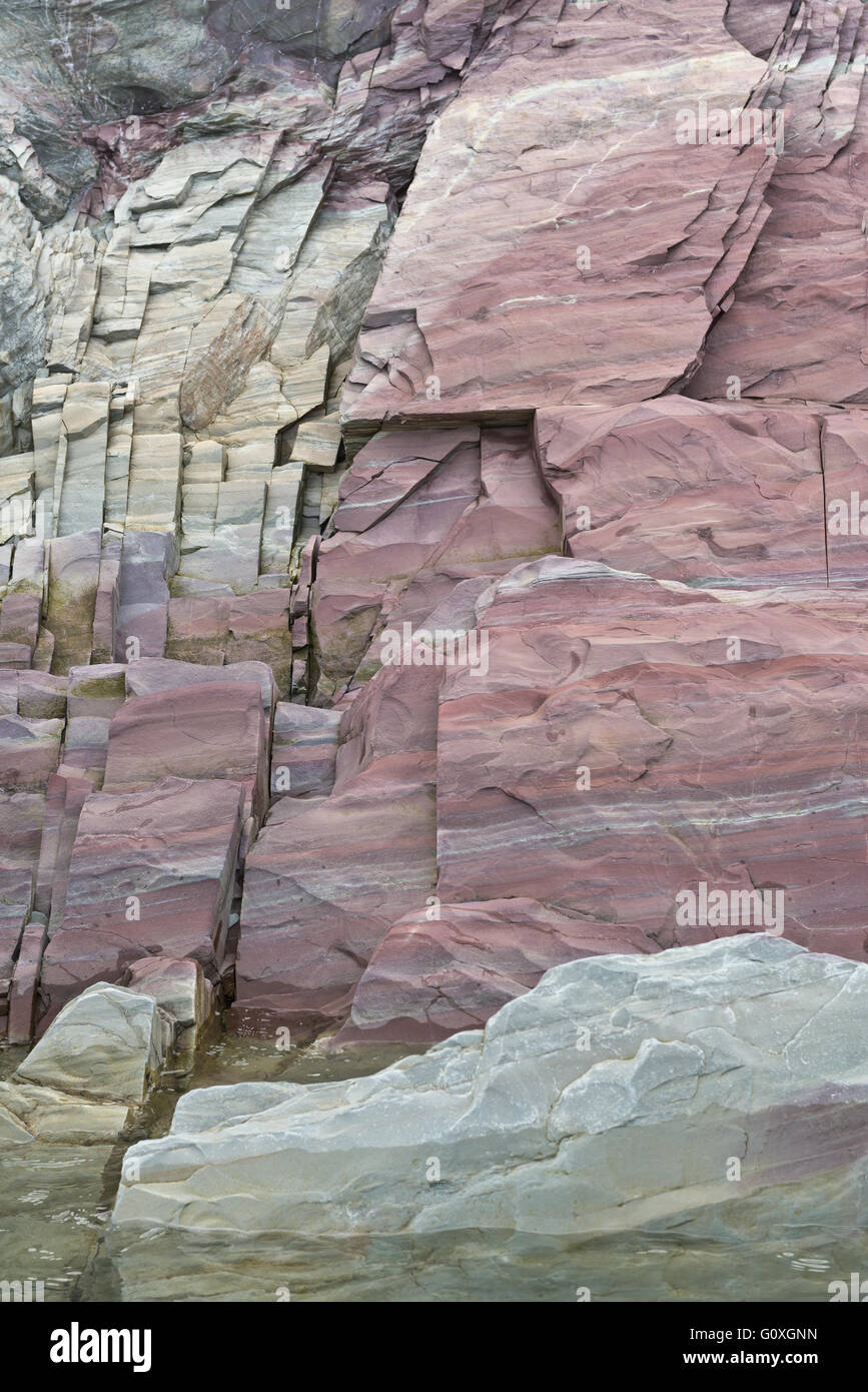 Colourful rocks in the sea cliffs at Murchinsonfjorden on ...