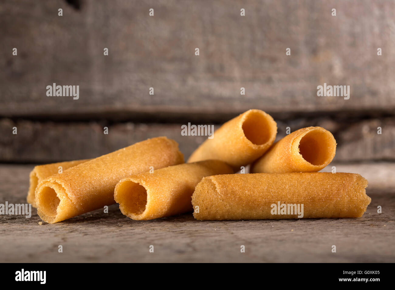 Sweet corn rolls over old rustic wooden background Stock Photo - Alamy