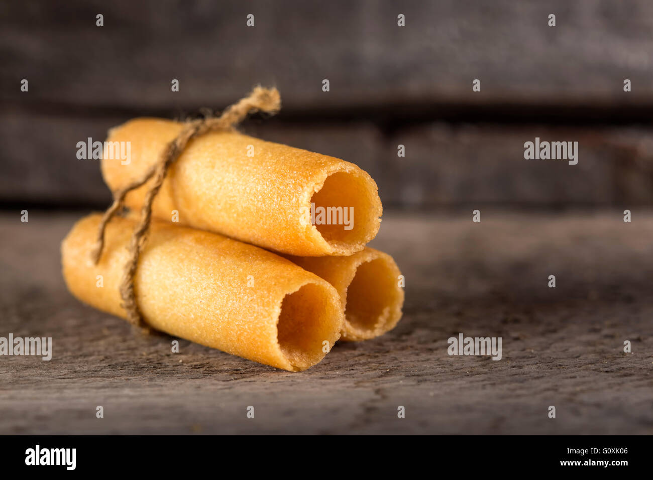 Sweet corn rolls over old rustic wooden background Stock Photo - Alamy