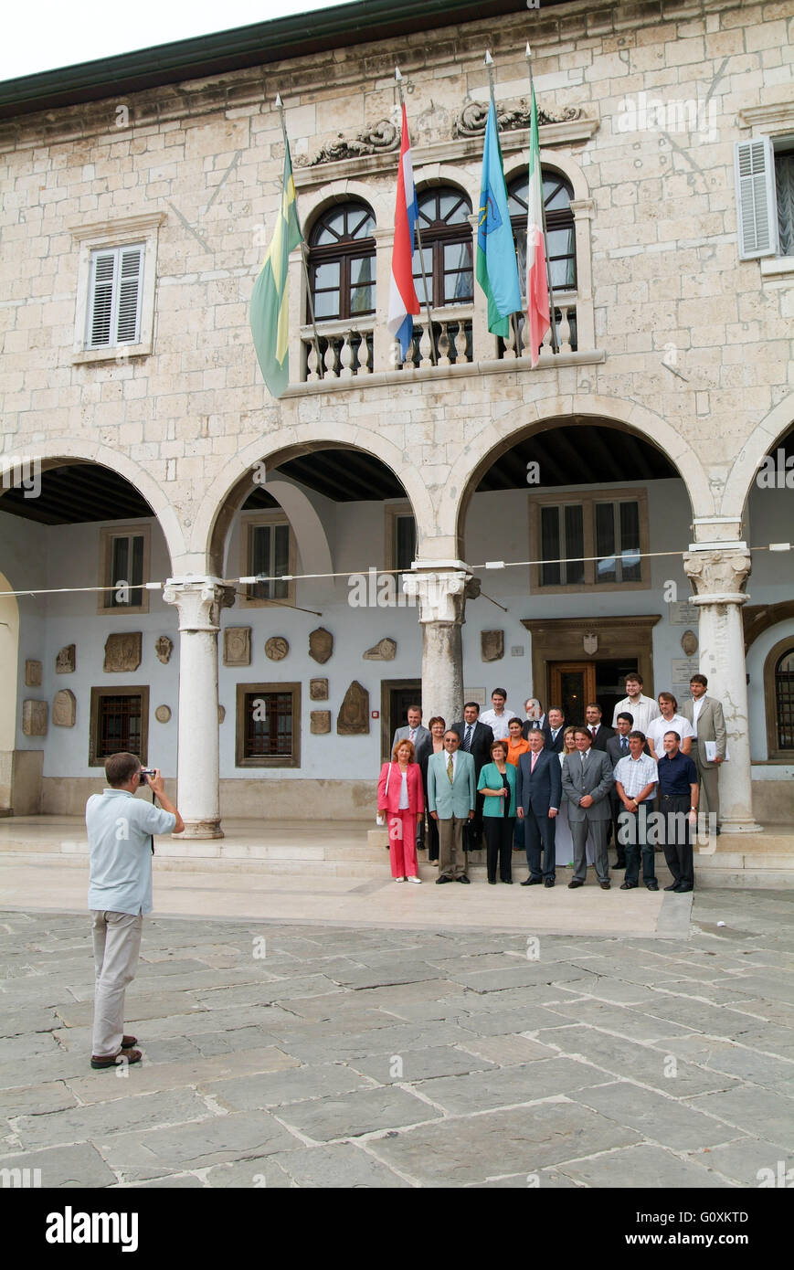 Pula, Croatia - 23 August 2005: Photographer taking a picture at a ...