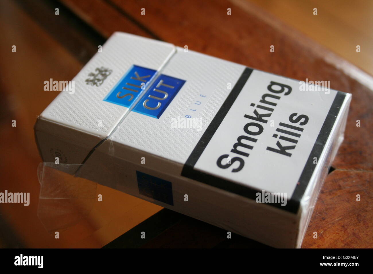 Packet of cigarettes with the warning smoking kills Stock Photo - Alamy