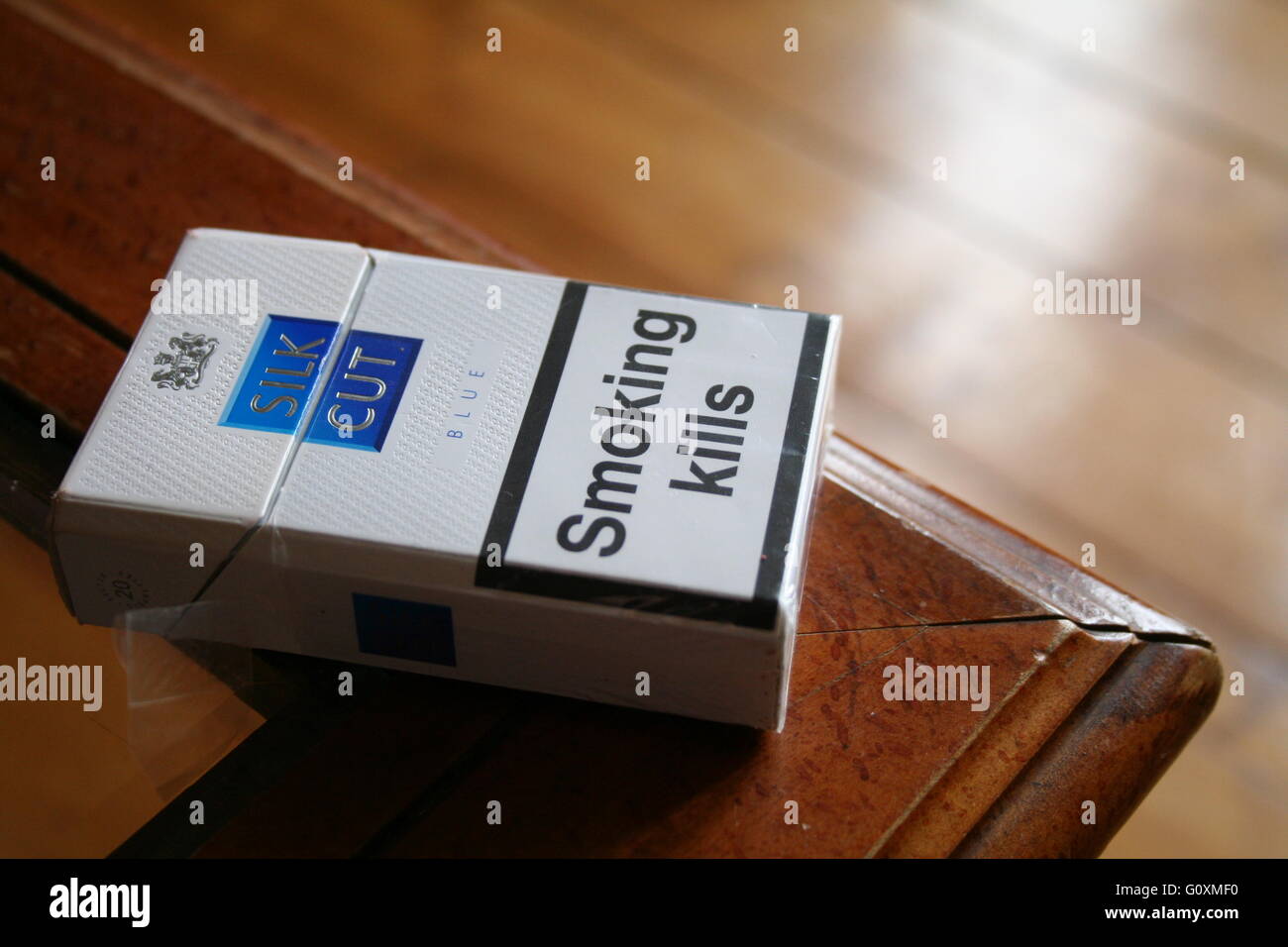 Packet of cigarettes with the warning smoking kills Stock Photo - Alamy
