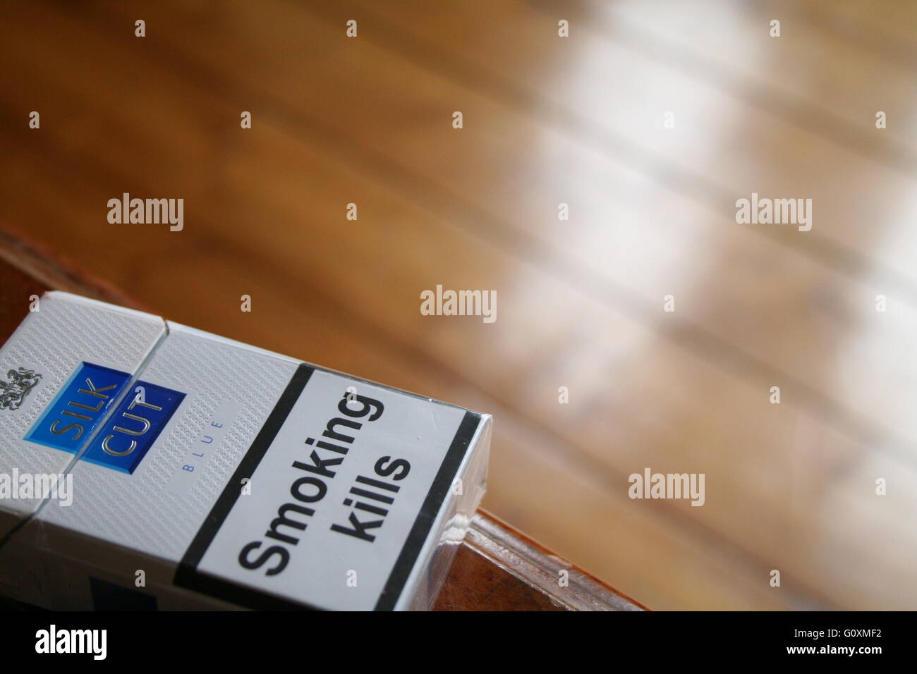 Packet of cigarettes with the warning smoking kills Stock Photo - Alamy