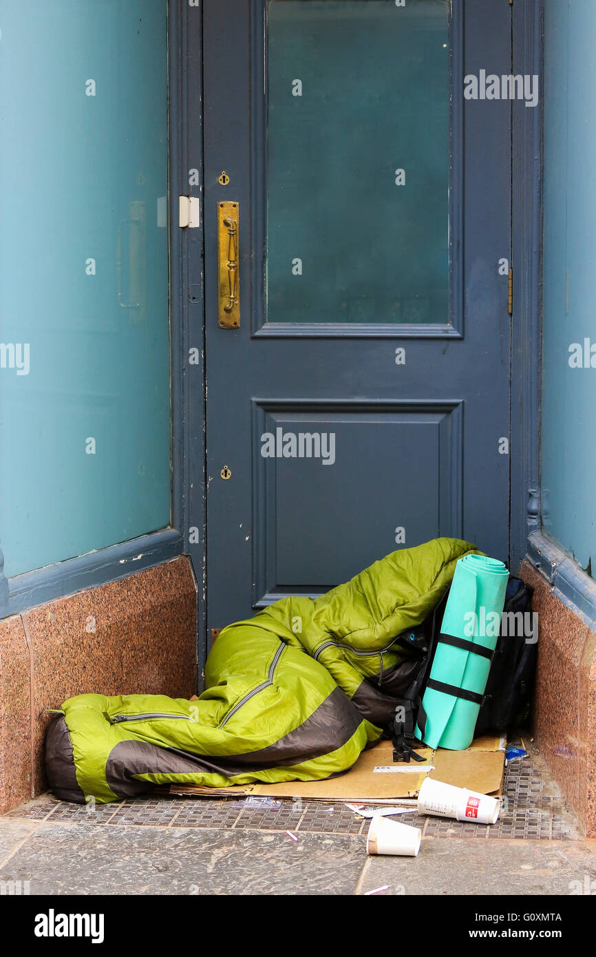 Person sleeping rough in a shop doorway, Glasgow, Scotland, UK Stock ...