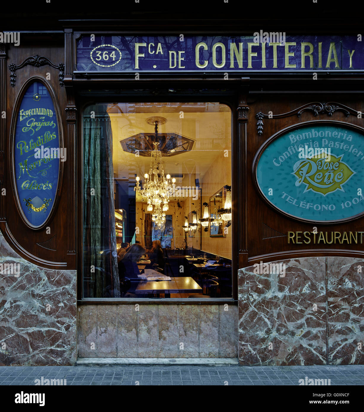 Rene Restaurant, Barcelona, Spain. Exterior wall with blue restaurant ...