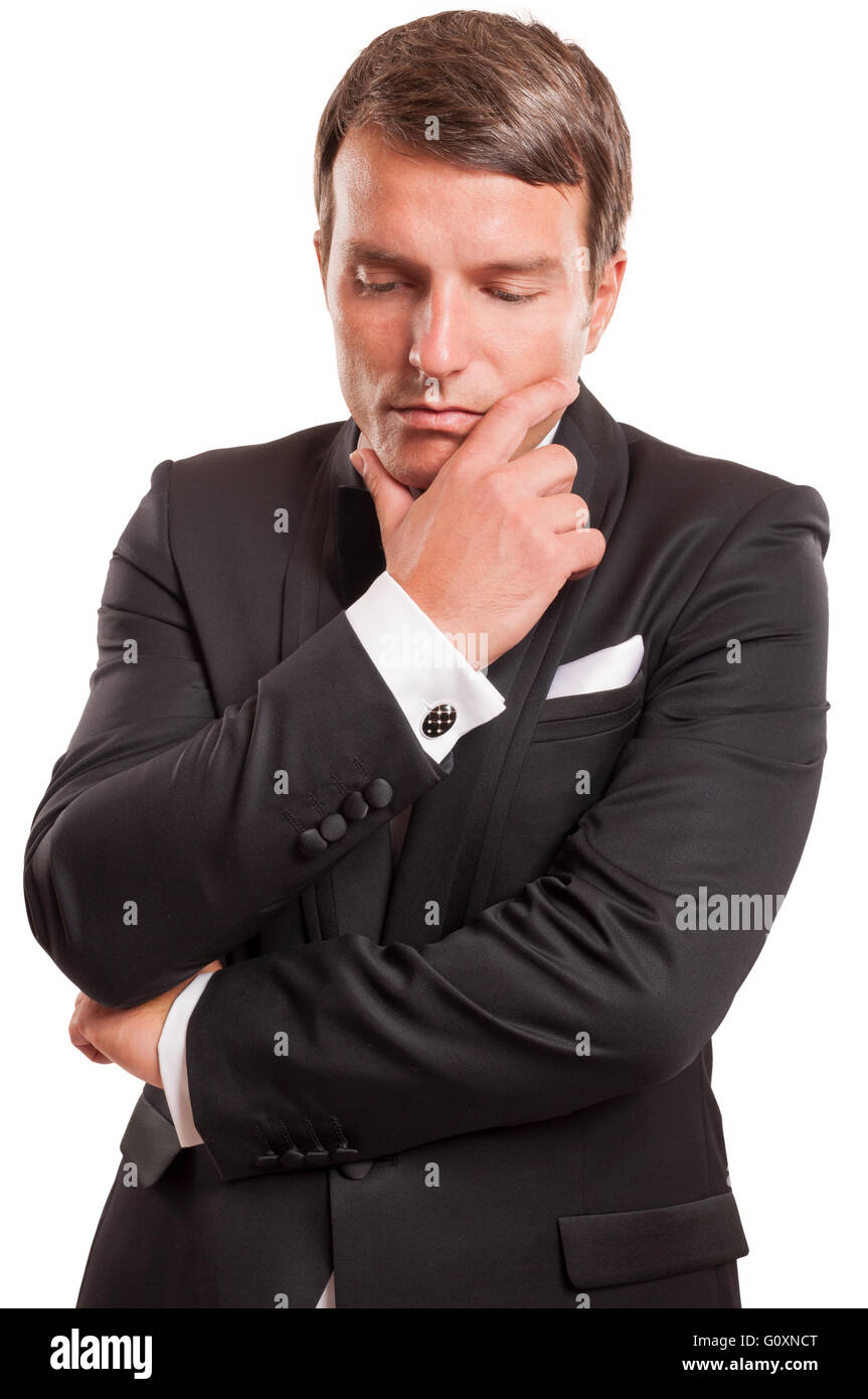 Real gentleman thinking at business while is wearing an elegant tuxedo ...