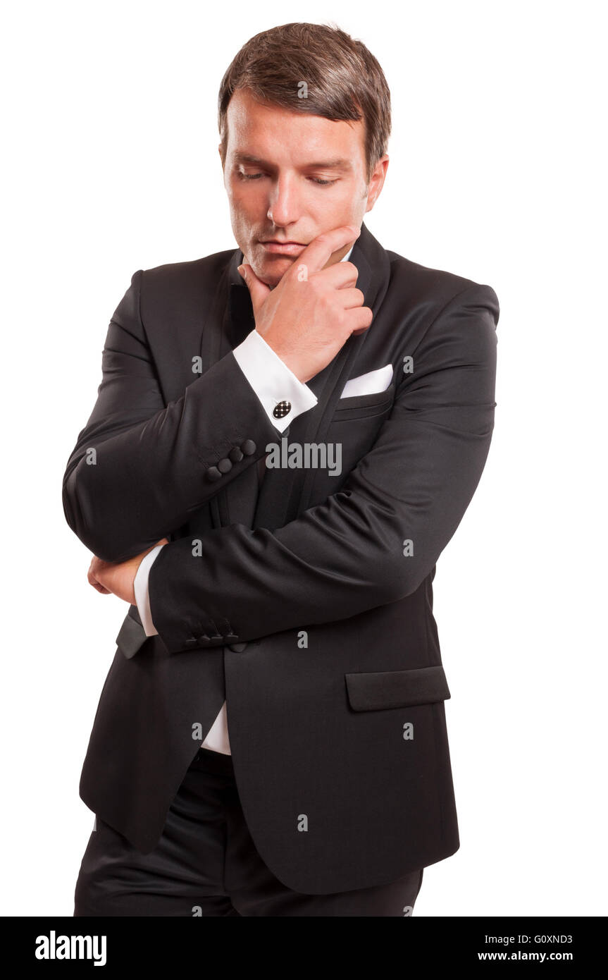 Real gentleman thinking at business while is wearing an elegant tuxedo ...
