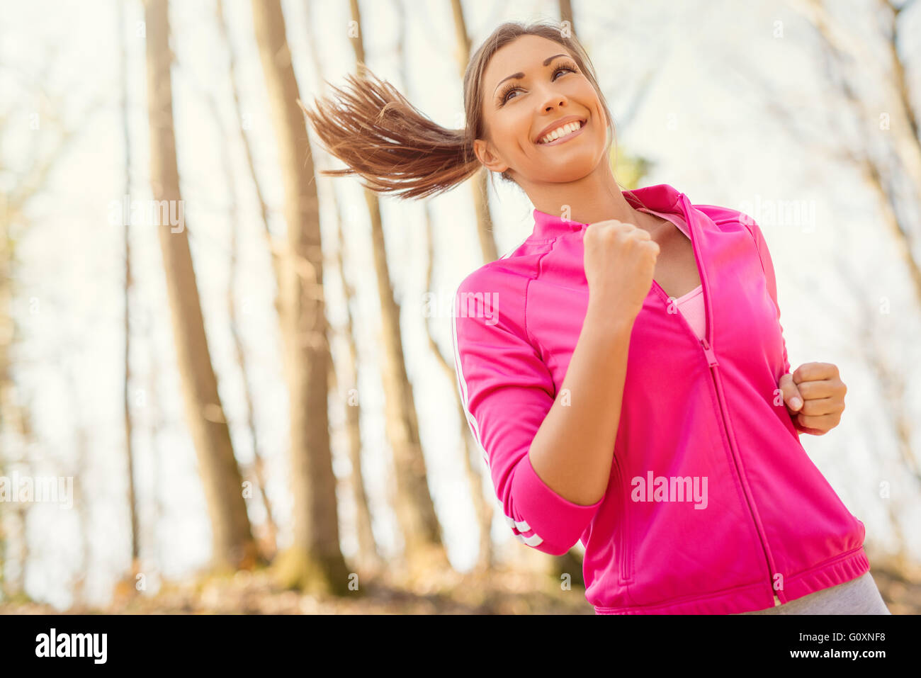 Athlete woman running through hi-res stock photography and images - Alamy
