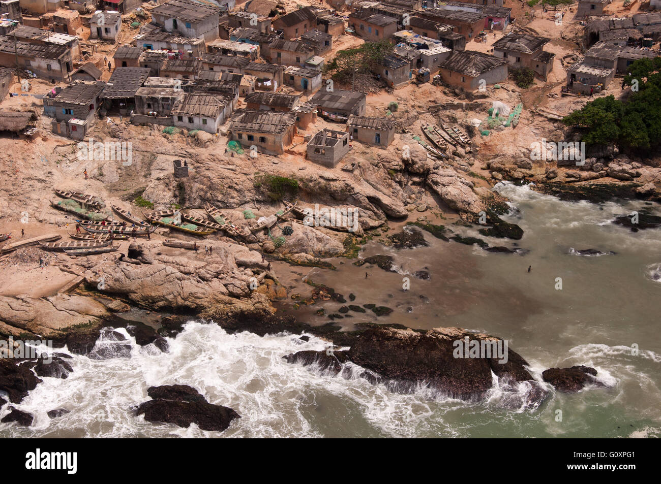 An aerial view of a fishing settlement between Cape Coast and the town ...
