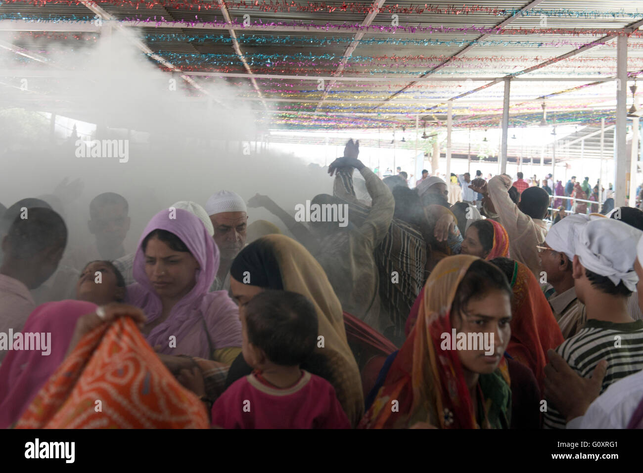 Hussain Tekri, Worshippers In Holy Smoke At The Shrine Stock Photo - Alamy