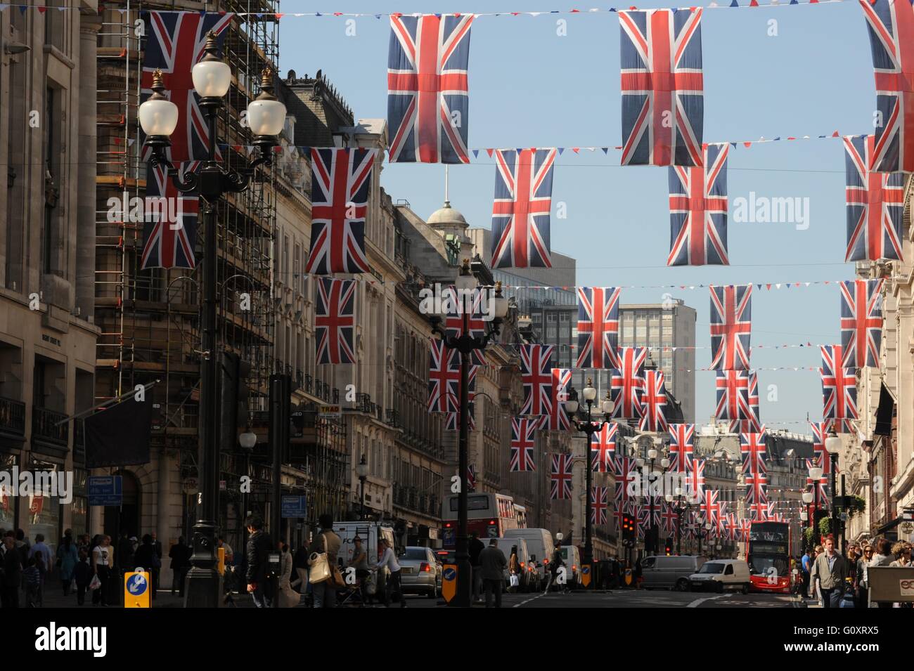 Union Jacks hanging over Regents street, London Stock Photo - Alamy