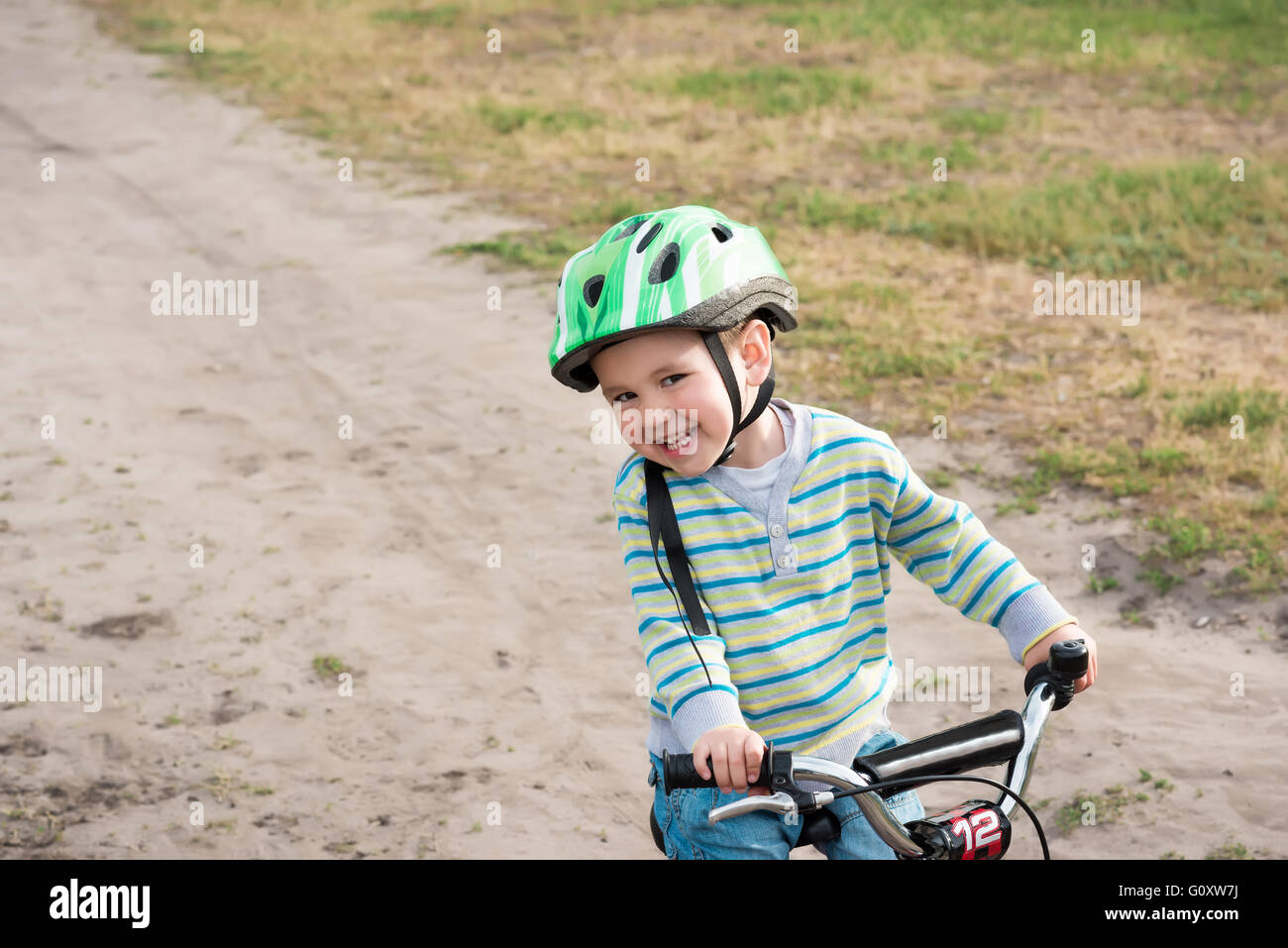 The child riding a bicycle Stock Photo - Alamy